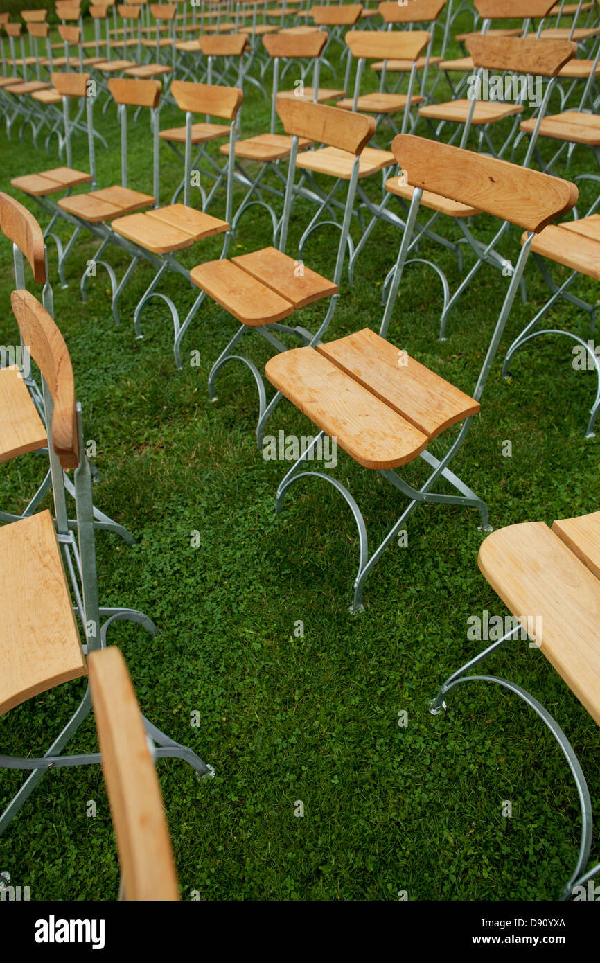 Rows on chairs on lawn Stock Photo - Alamy