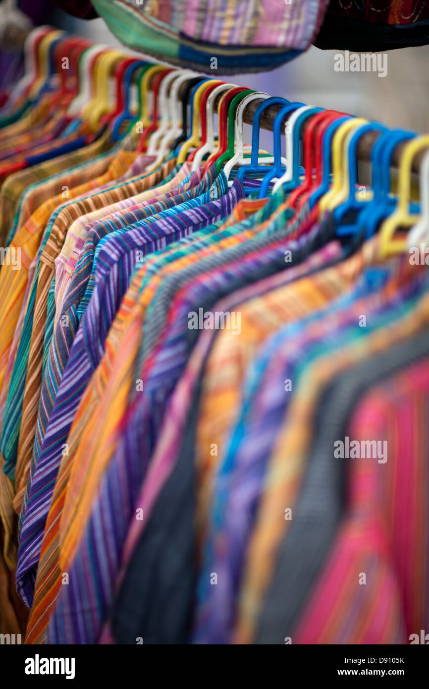 Colorful blouses on rack Stock Photo - Alamy