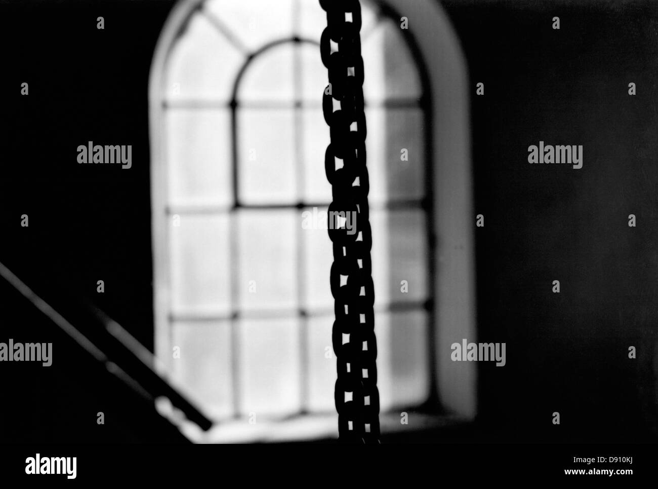 A chain in front of a window Stock Photo - Alamy