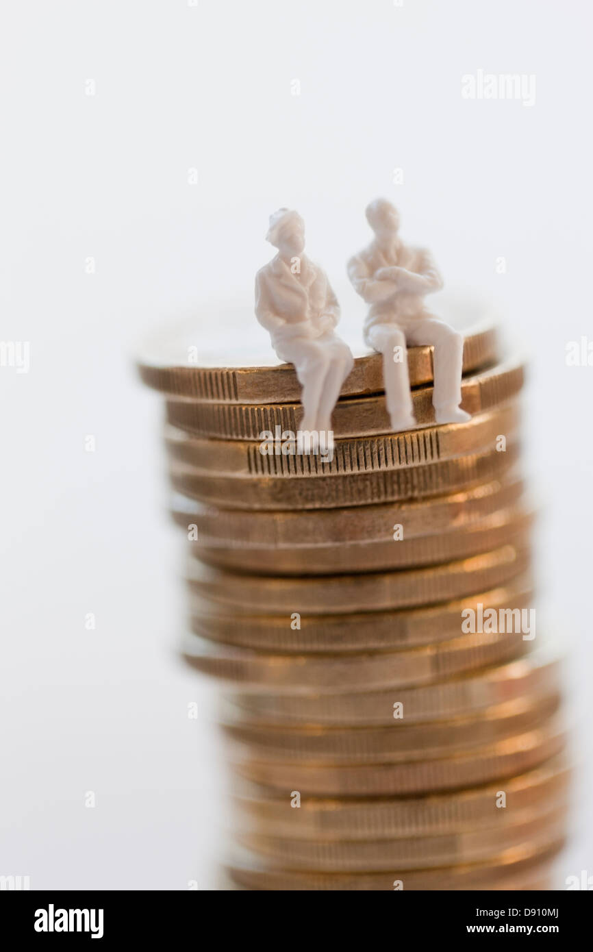 Money stack figurines hi-res stock photography and images - Alamy
