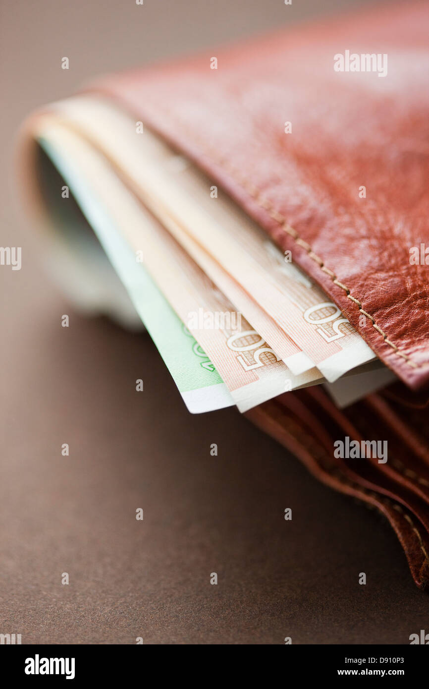 Wallet with cash Stock Photo - Alamy