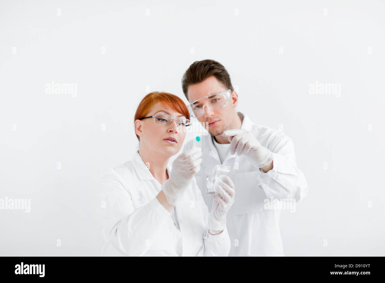 Two scientists working in laboratory Stock Photo - Alamy