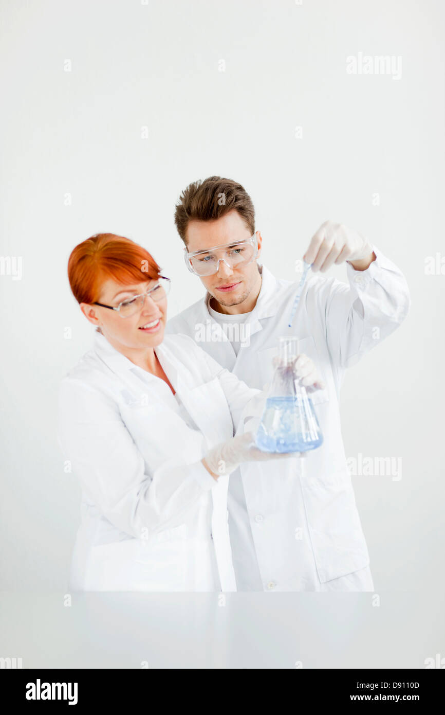 Two scientists working in laboratory Stock Photo - Alamy