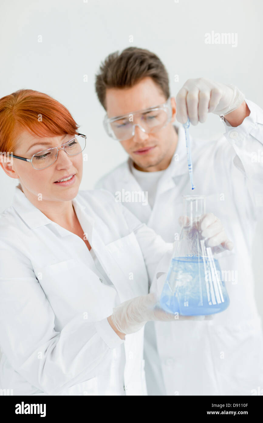 Two scientists working in laboratory Stock Photo - Alamy