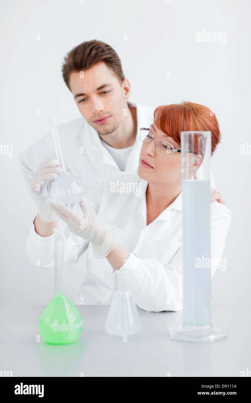 Two scientists working in laboratory Stock Photo - Alamy