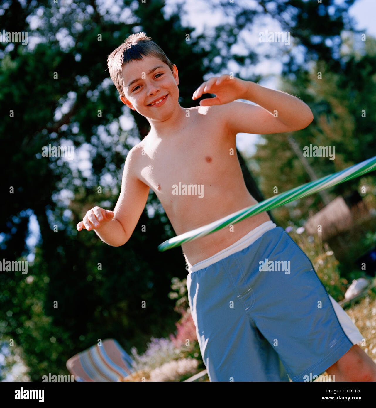 A boy with a hula hoop, Sweden Stock Photo - Alamy