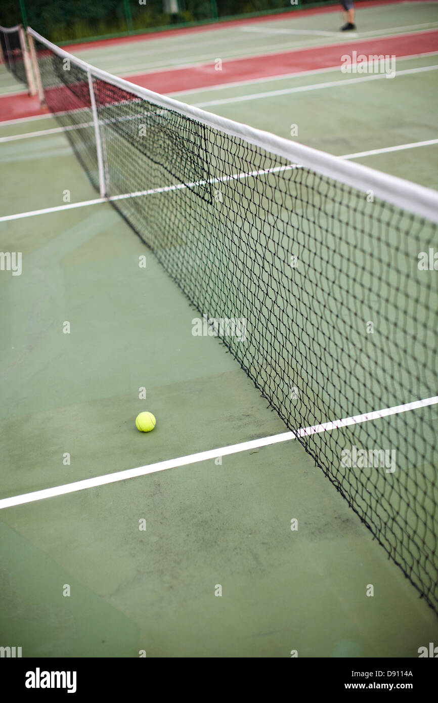 High angle view of net and tennis ball Stock Photo - Alamy