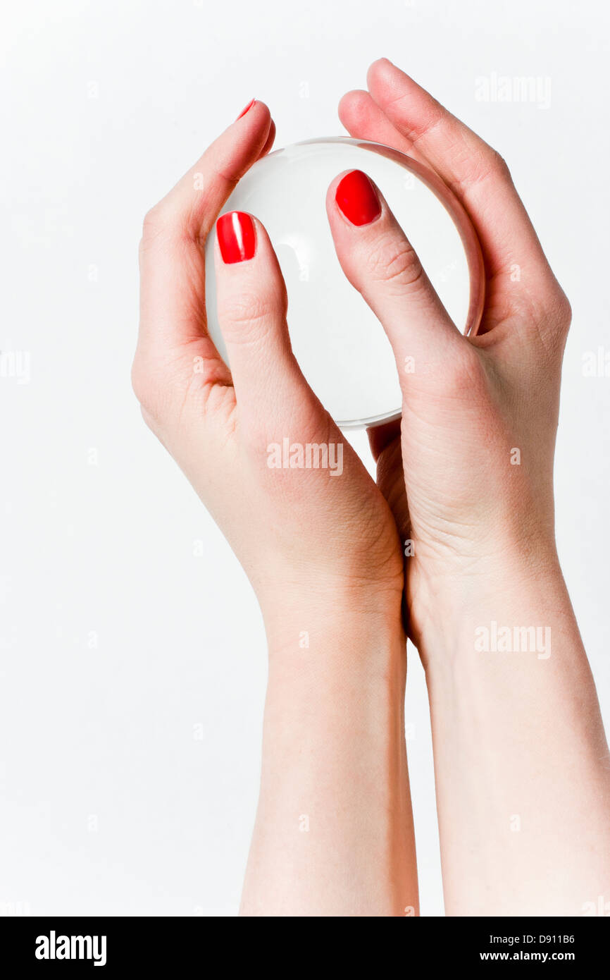 Hand holding marbles hi-res stock photography and images - Alamy
