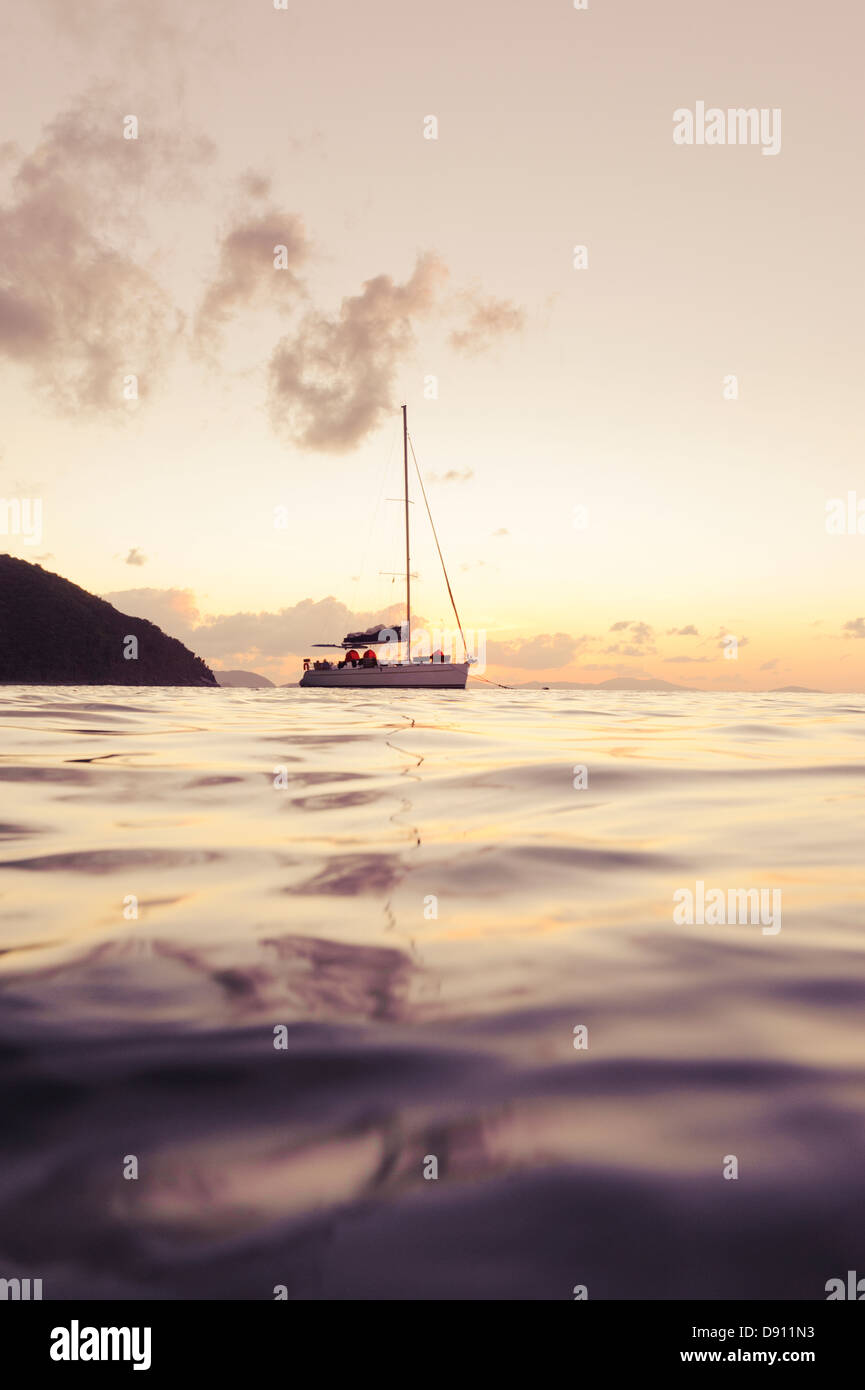 Sailing boat at sunset hi-res stock photography and images - Alamy