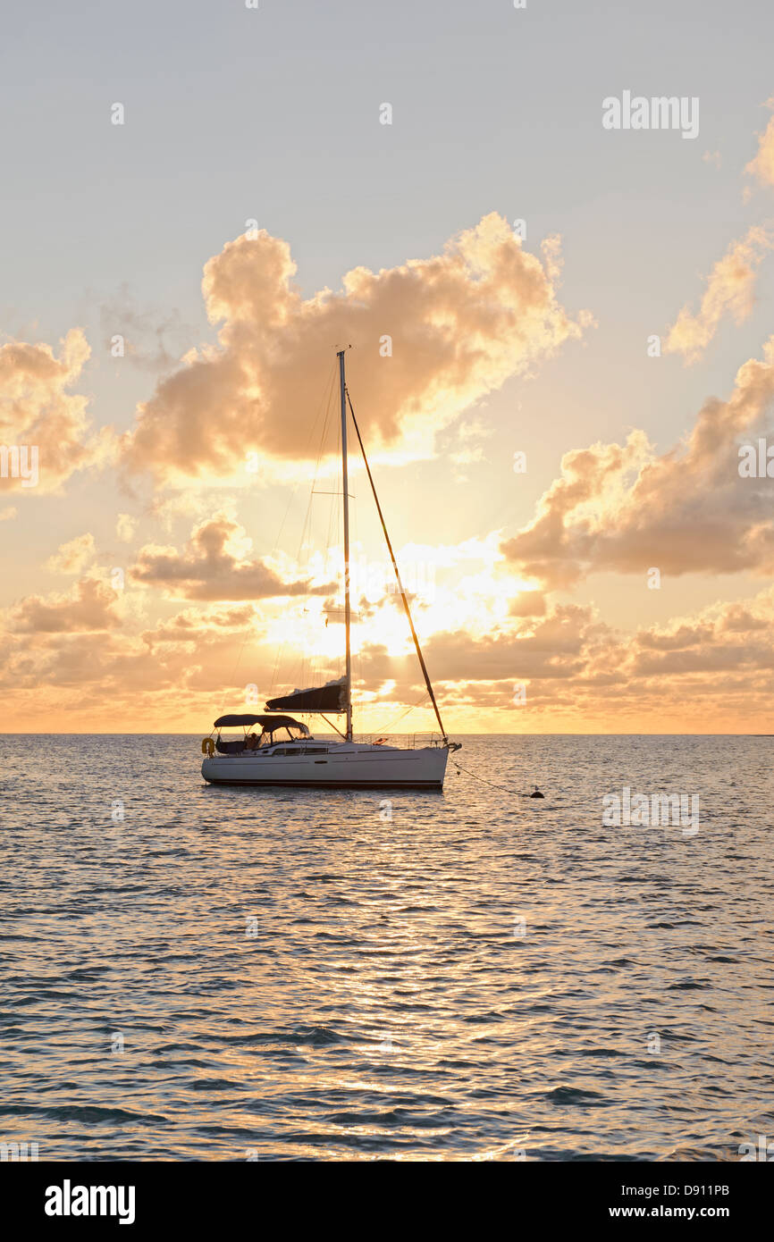 Sailing boat at sunset hi-res stock photography and images - Alamy