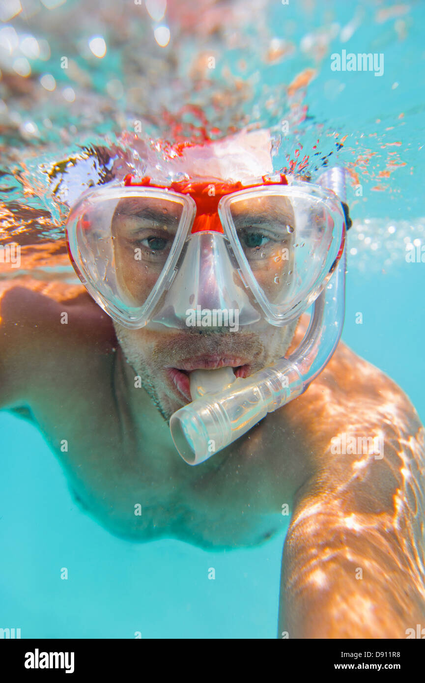 Underwater portrait of man diving Stock Photo - Alamy