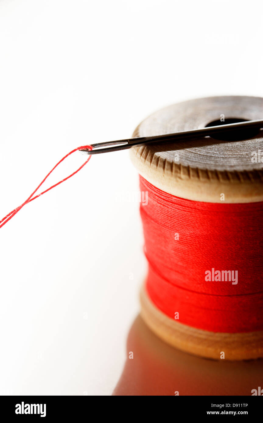 Thread spool with needle hi-res stock photography and images - Alamy