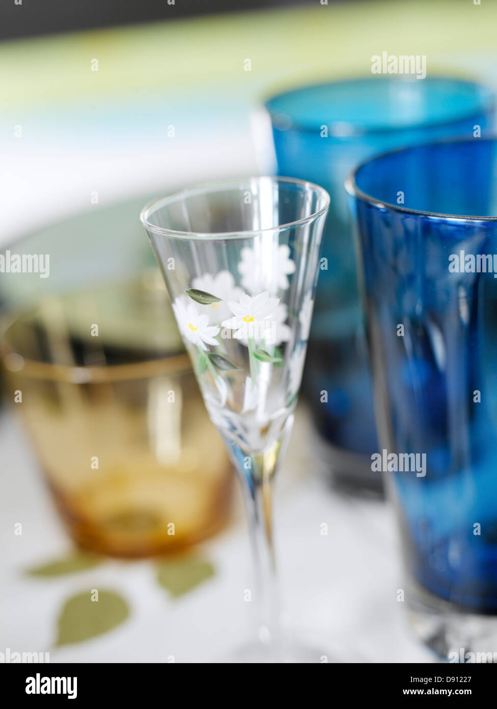 Glasses on a set table, close-up Stock Photo - Alamy