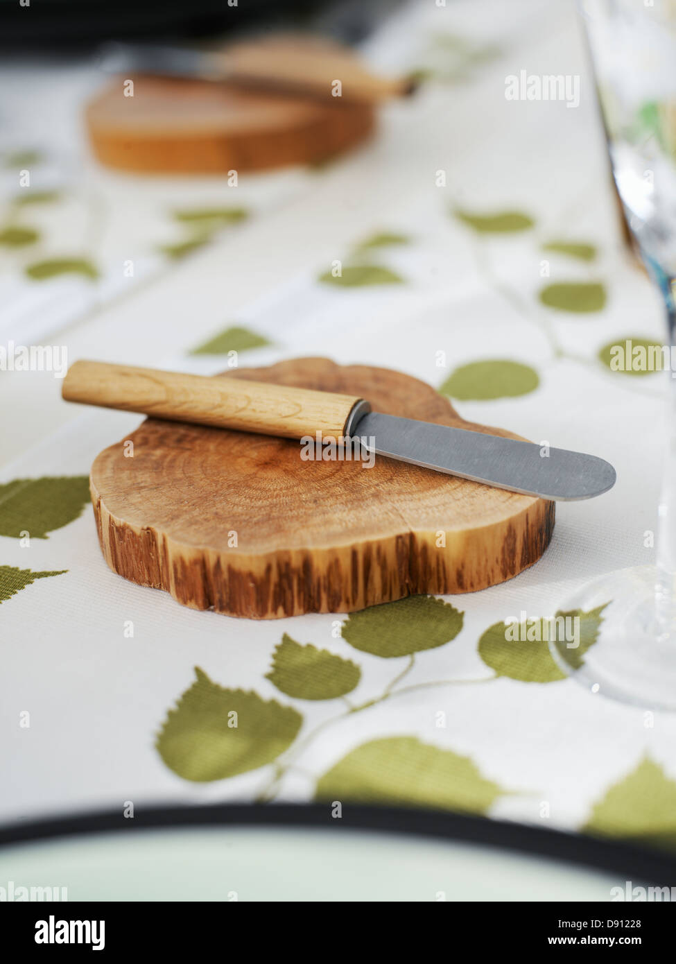 A butter-knife on a table, close-up Stock Photo - Alamy