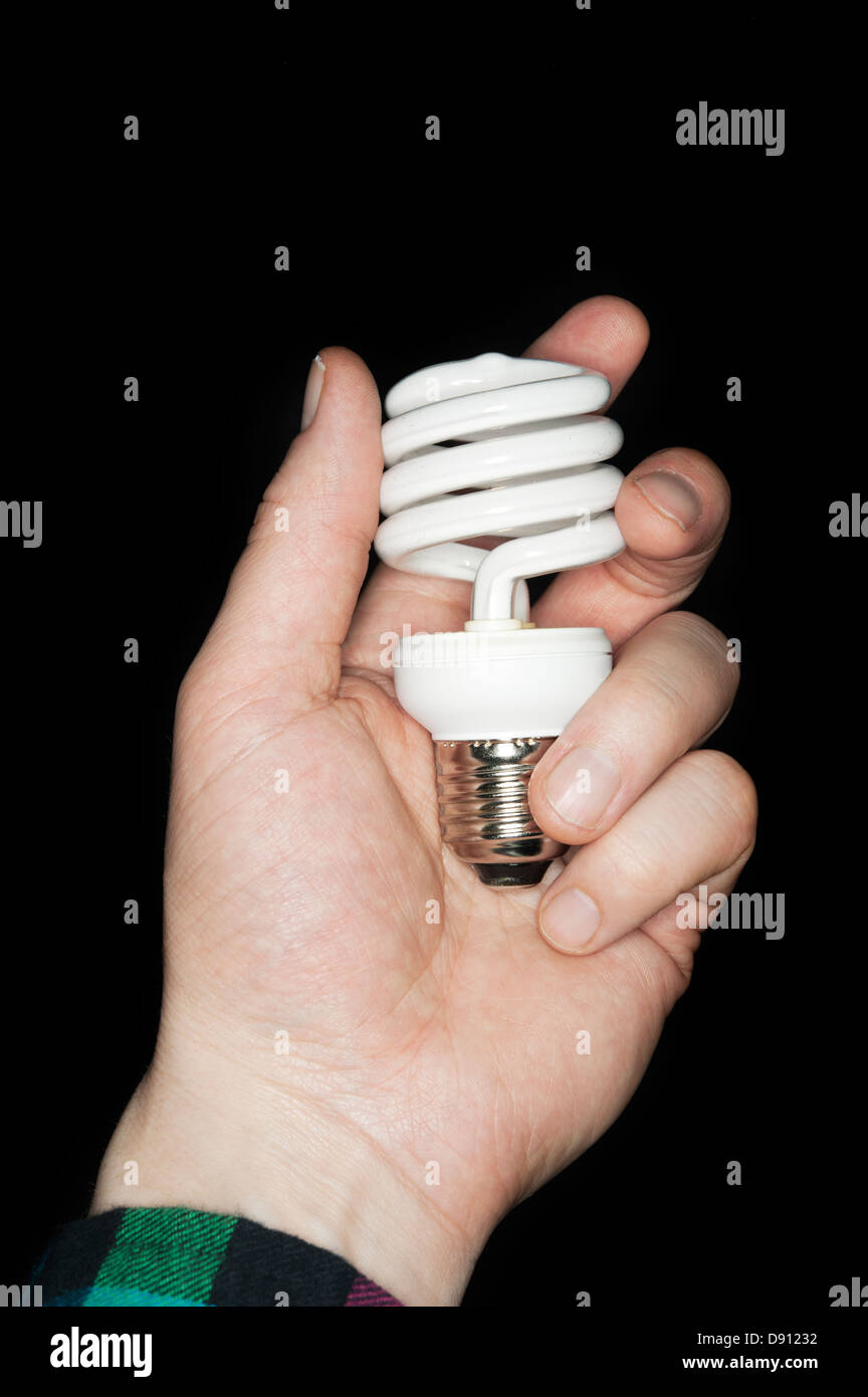 Human hand holding light bulb Stock Photo - Alamy