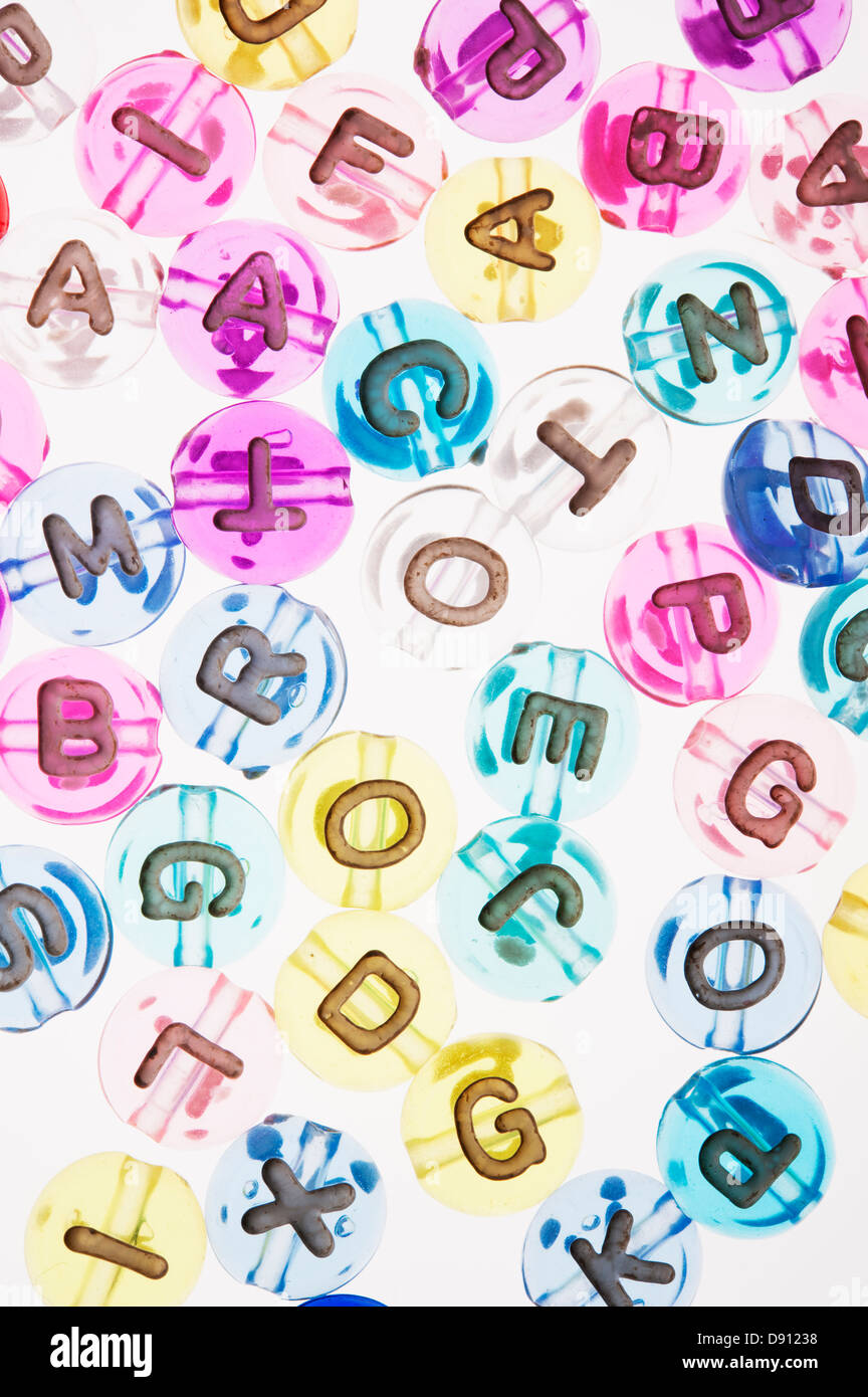 Multicolored letters on white background Stock Photo - Alamy