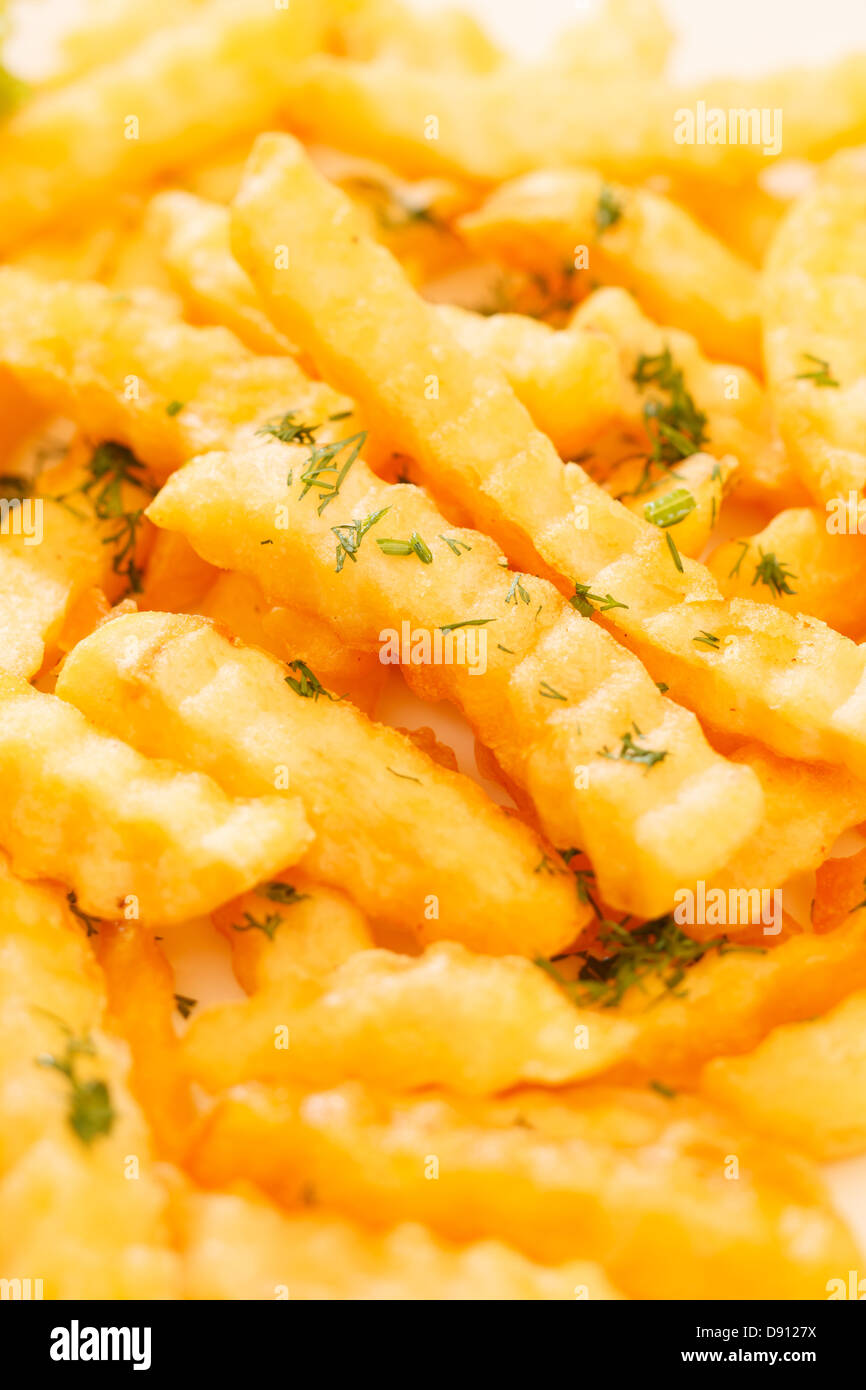 Golden French fries potatoes Stock Photo - Alamy