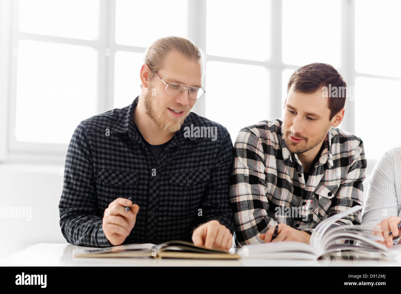 Students studying in library Stock Photo - Alamy