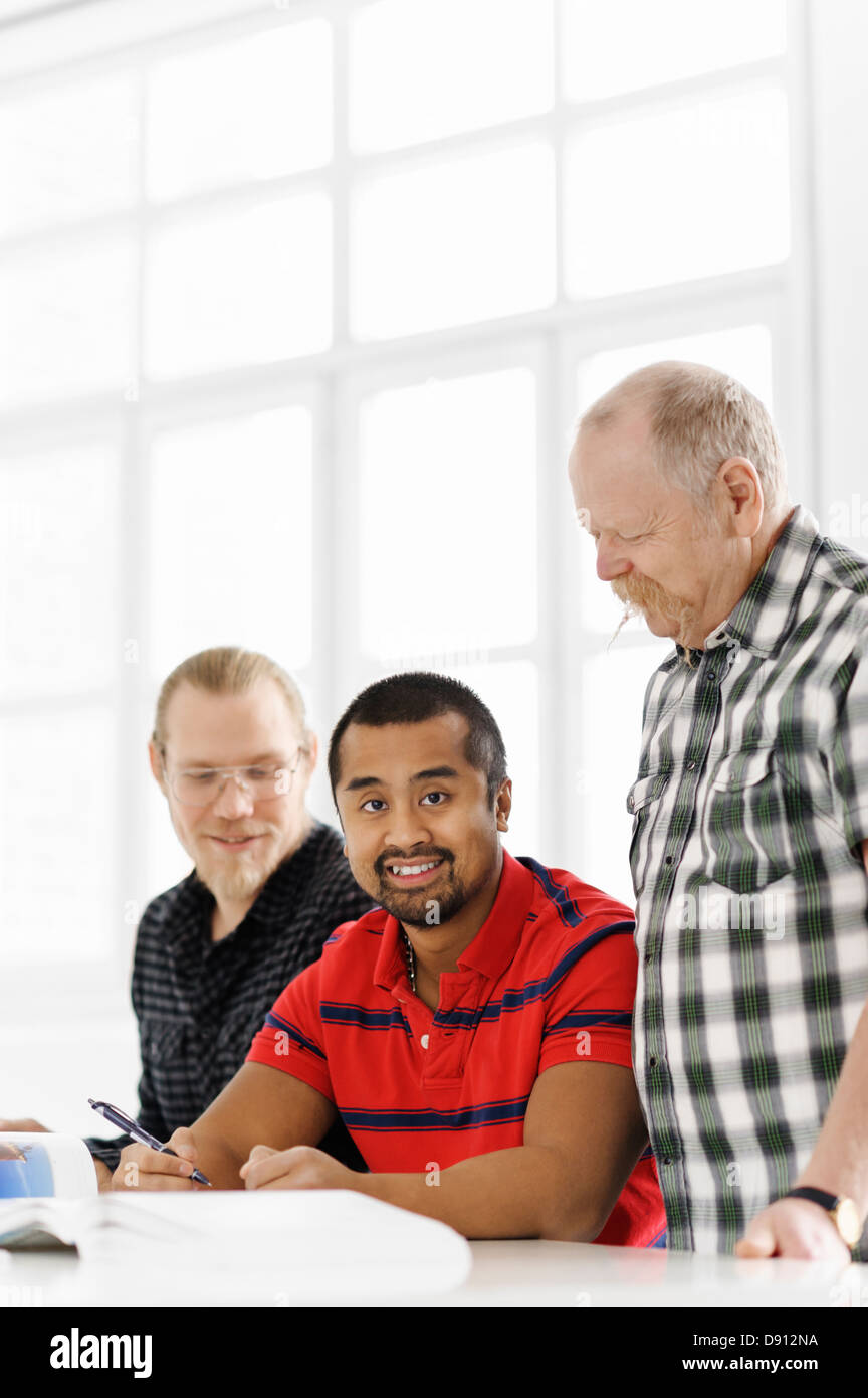 Vertical view international students sitting hi-res stock photography ...