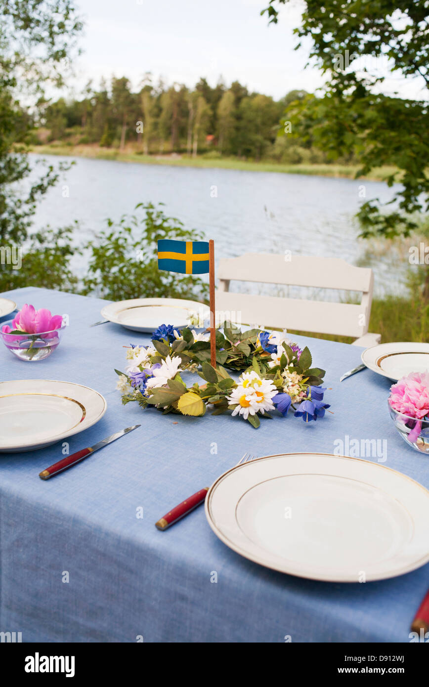 Table ready for midsummer celebration Stock Photo - Alamy