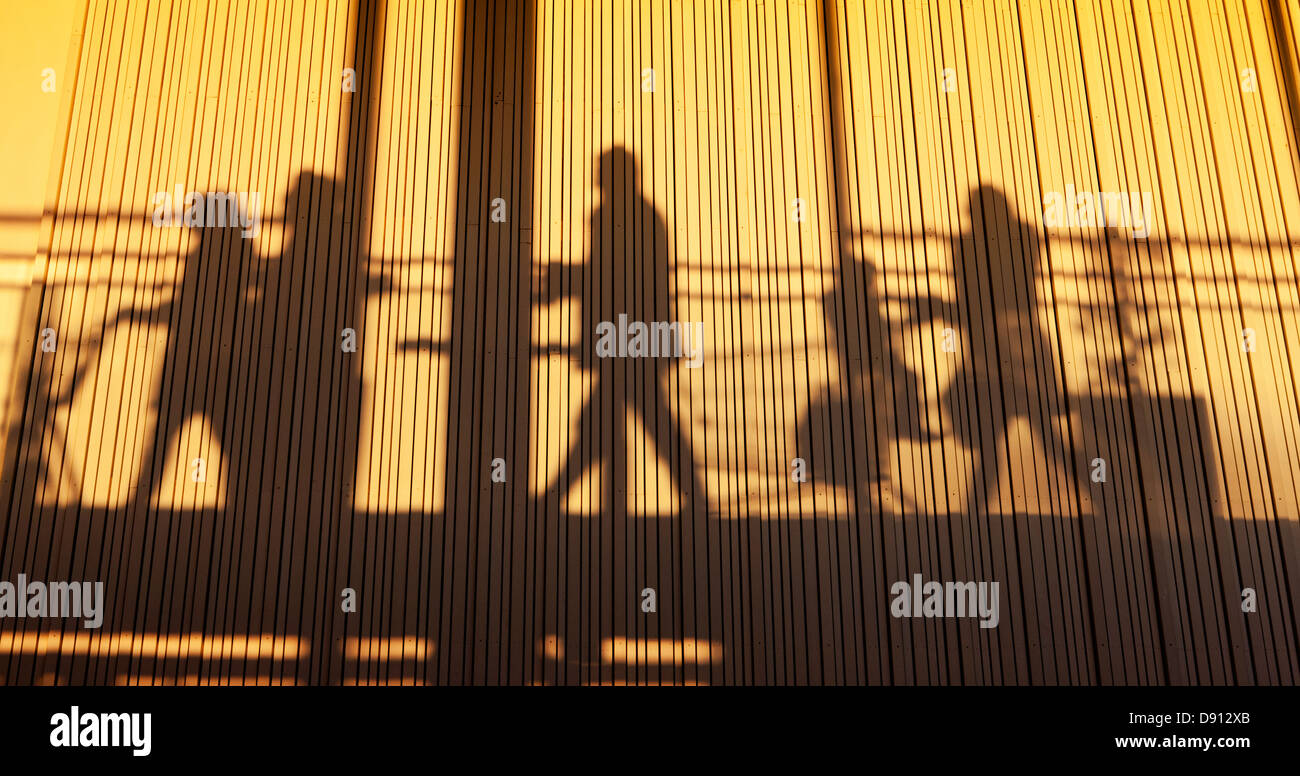Shadow of people in shopping mall Stock Photo - Alamy