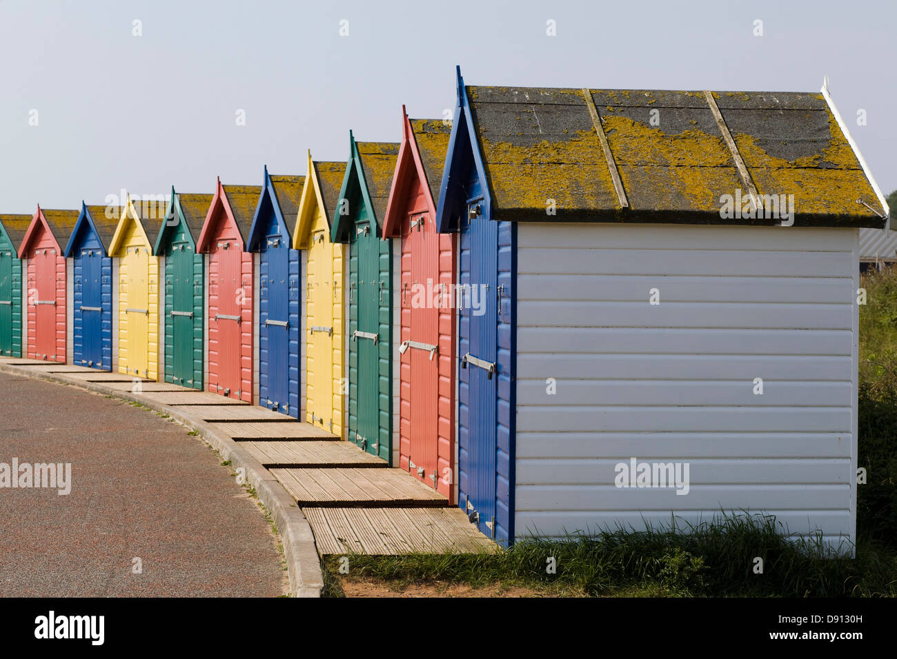 Colourful beach huts at a traditional British Beach Stock Photo - Alamy