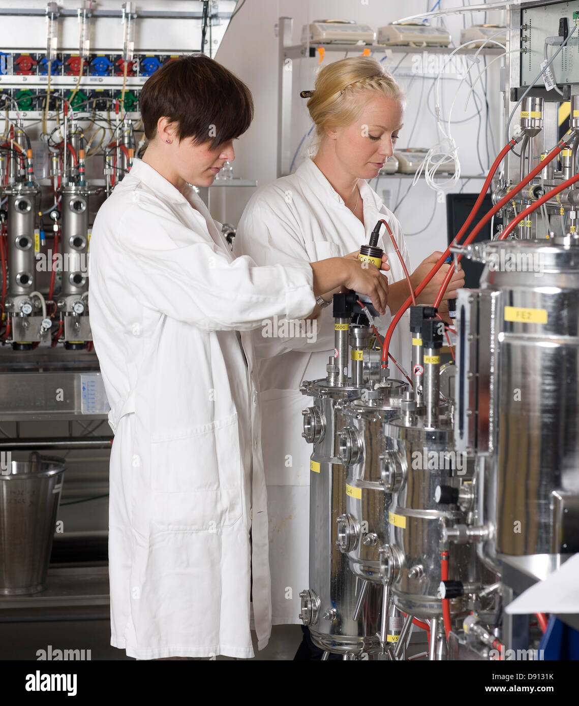 Researchers in laboratory Stock Photo - Alamy