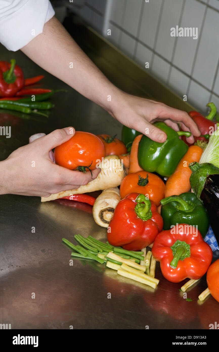 A cook preparing food in a restaurant kitchen, Sweden Stock Photo - Alamy