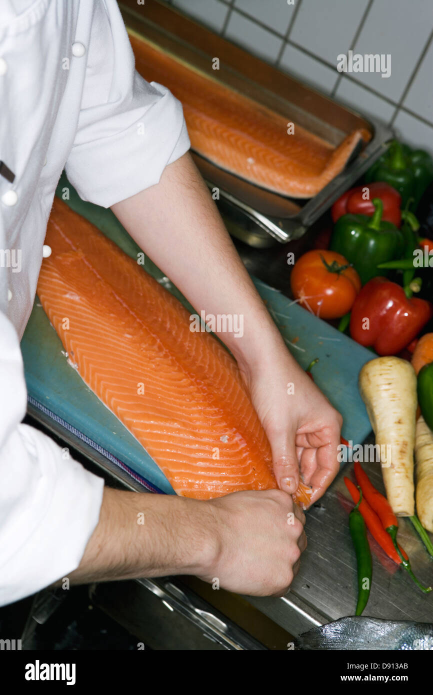 A cook preparing food in a restaurant kitchen, Sweden Stock Photo - Alamy