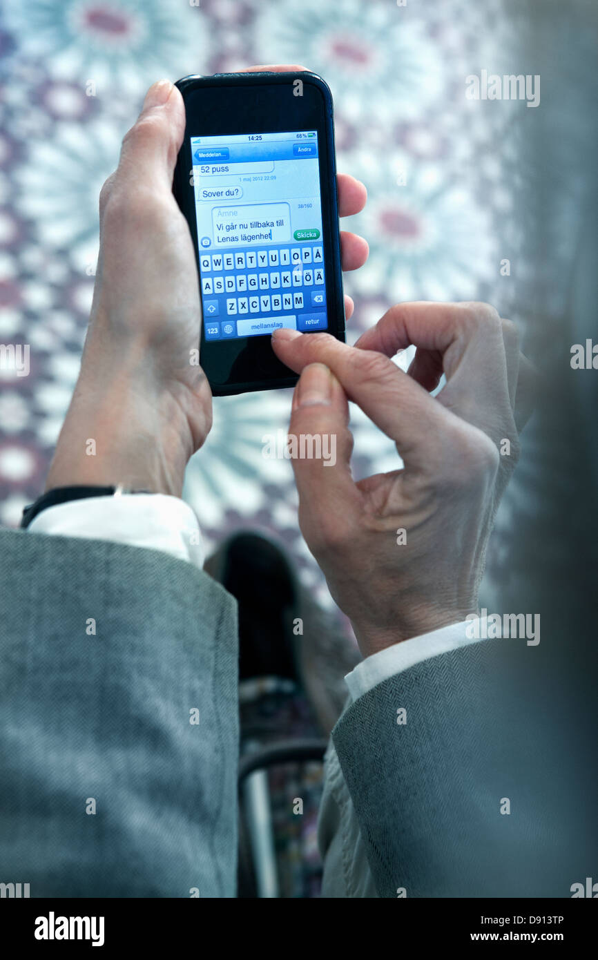 Close-up of womans hands using cell phone Stock Photo - Alamy