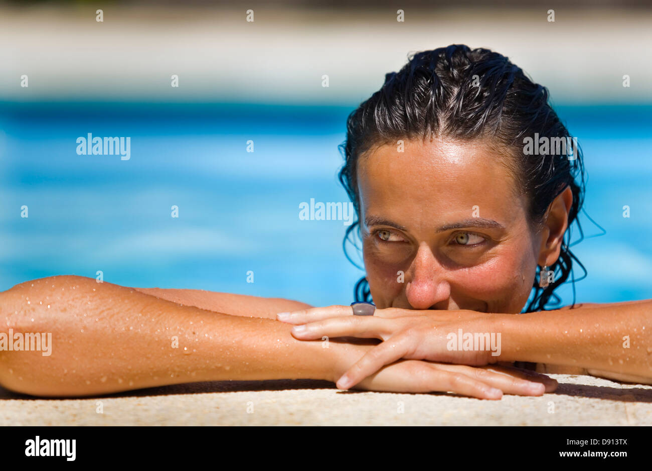 Woman pool sunbath hi-res stock photography and images - Alamy
