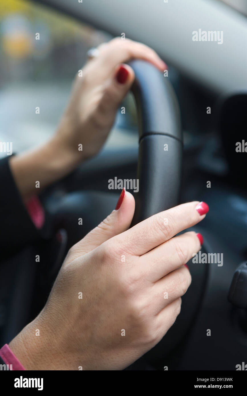 The hands of a woman in a car, Sweden Stock Photo - Alamy