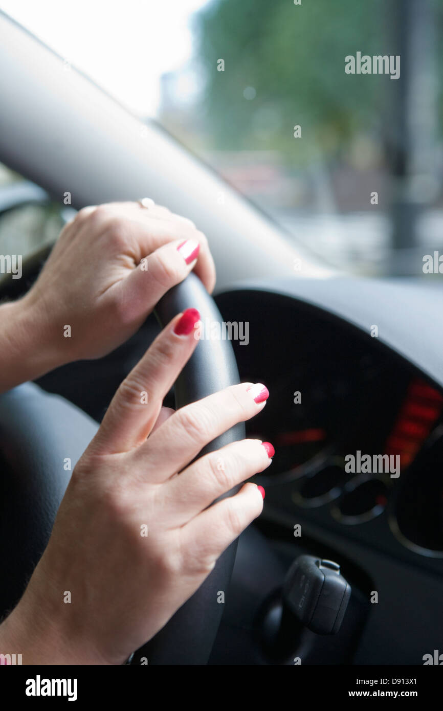 The hands of a woman in a car, Sweden Stock Photo - Alamy