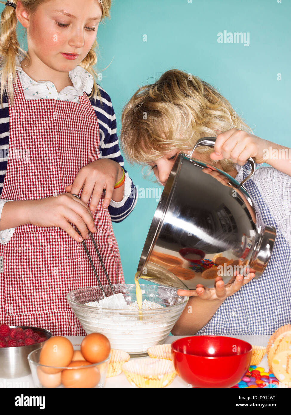Children baking cakes, Denmark Stock Photo - Alamy