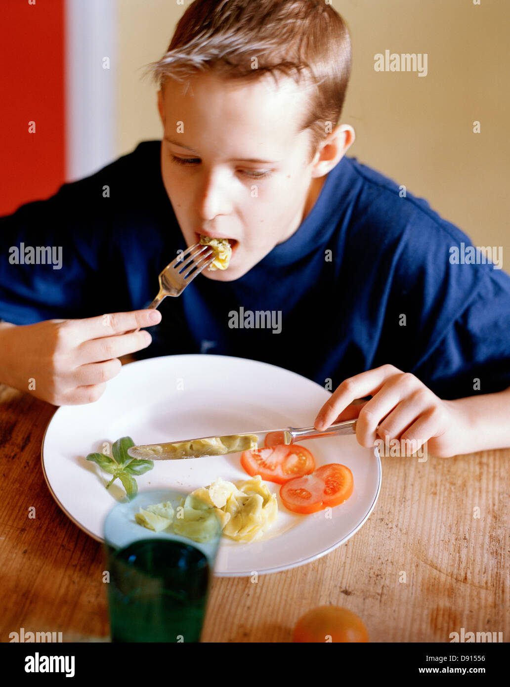 A boy eating food, Sweden Stock Photo - Alamy