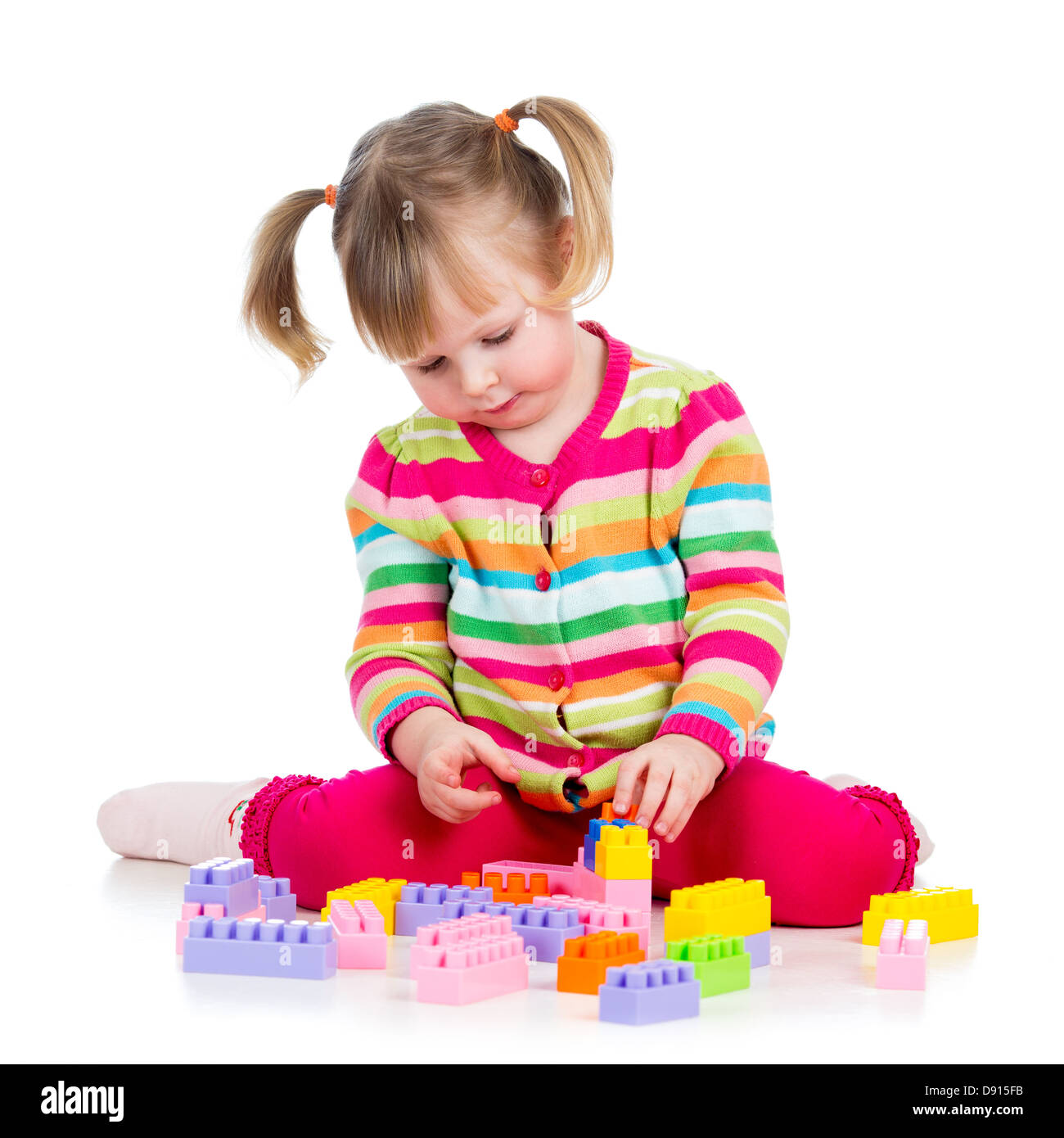 child girl playing with construction set over white background Stock ...