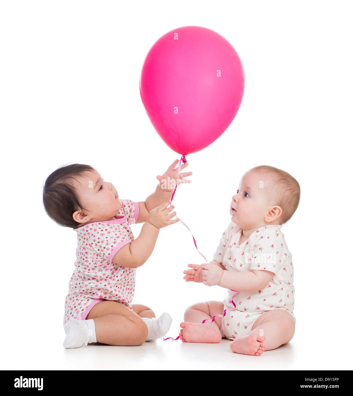 kids girls play red balloon isolated on white Stock Photo - Alamy