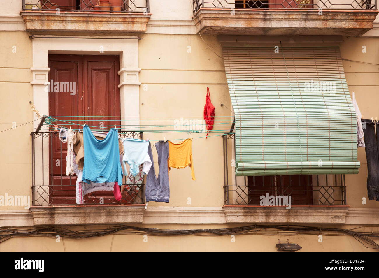 Clothes on a clothes line, Spain Stock Photo - Alamy