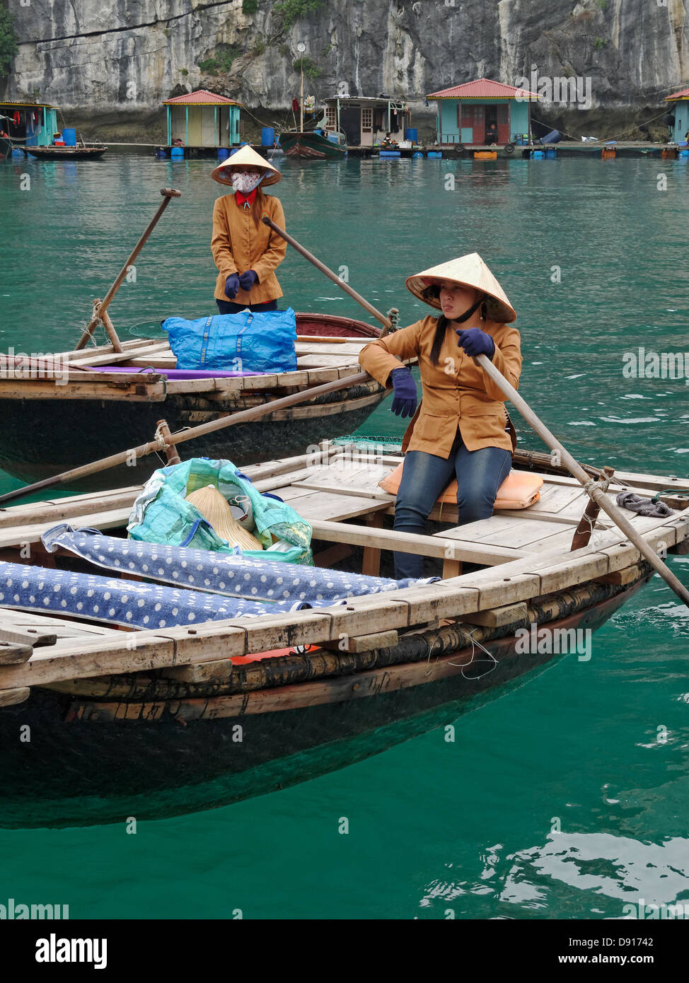 Boats waiting for tourists visiting the Vung Vieng floating village ...