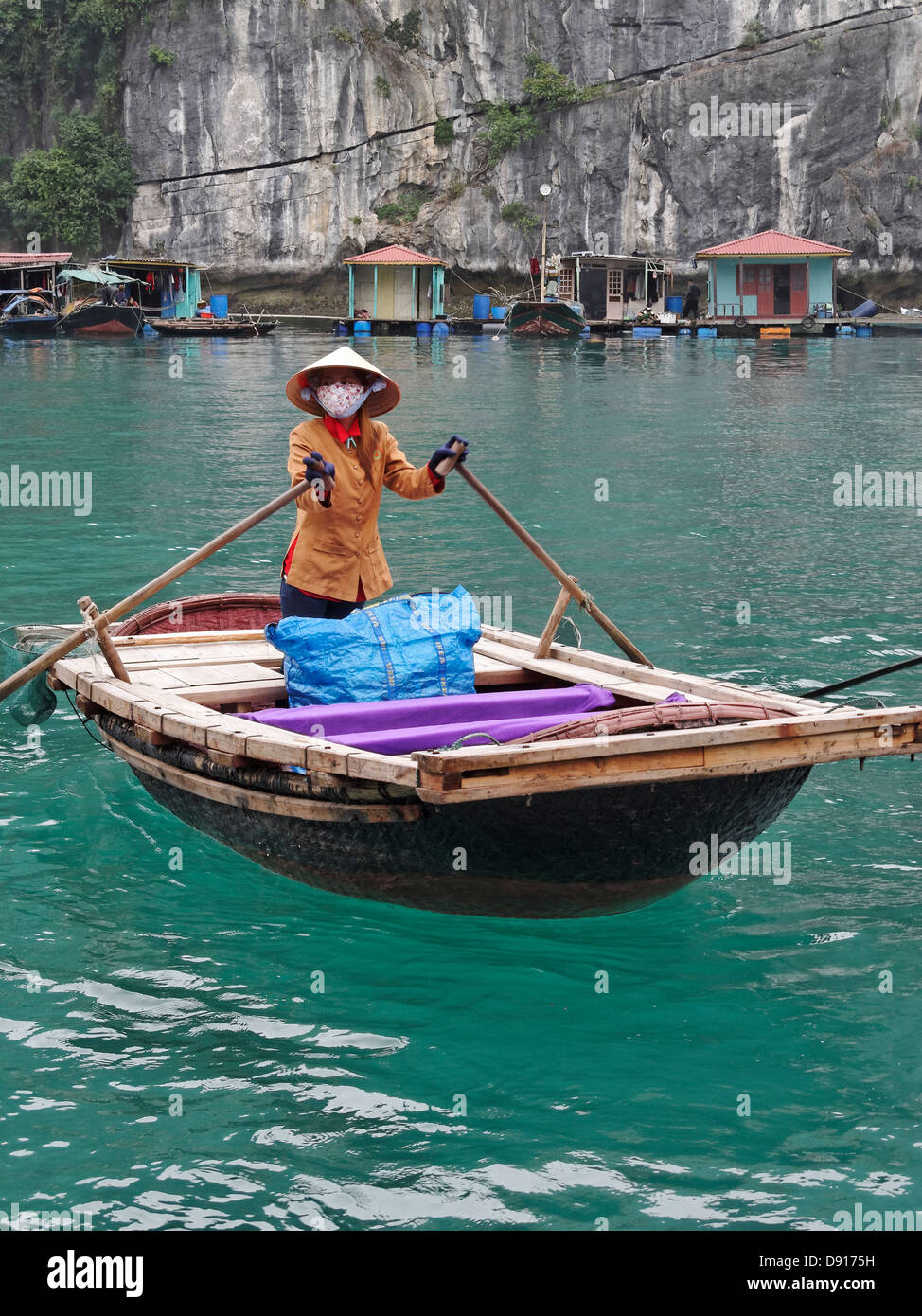 Boat waiting for tourists visiting the Vung Vieng floating village, Bai ...