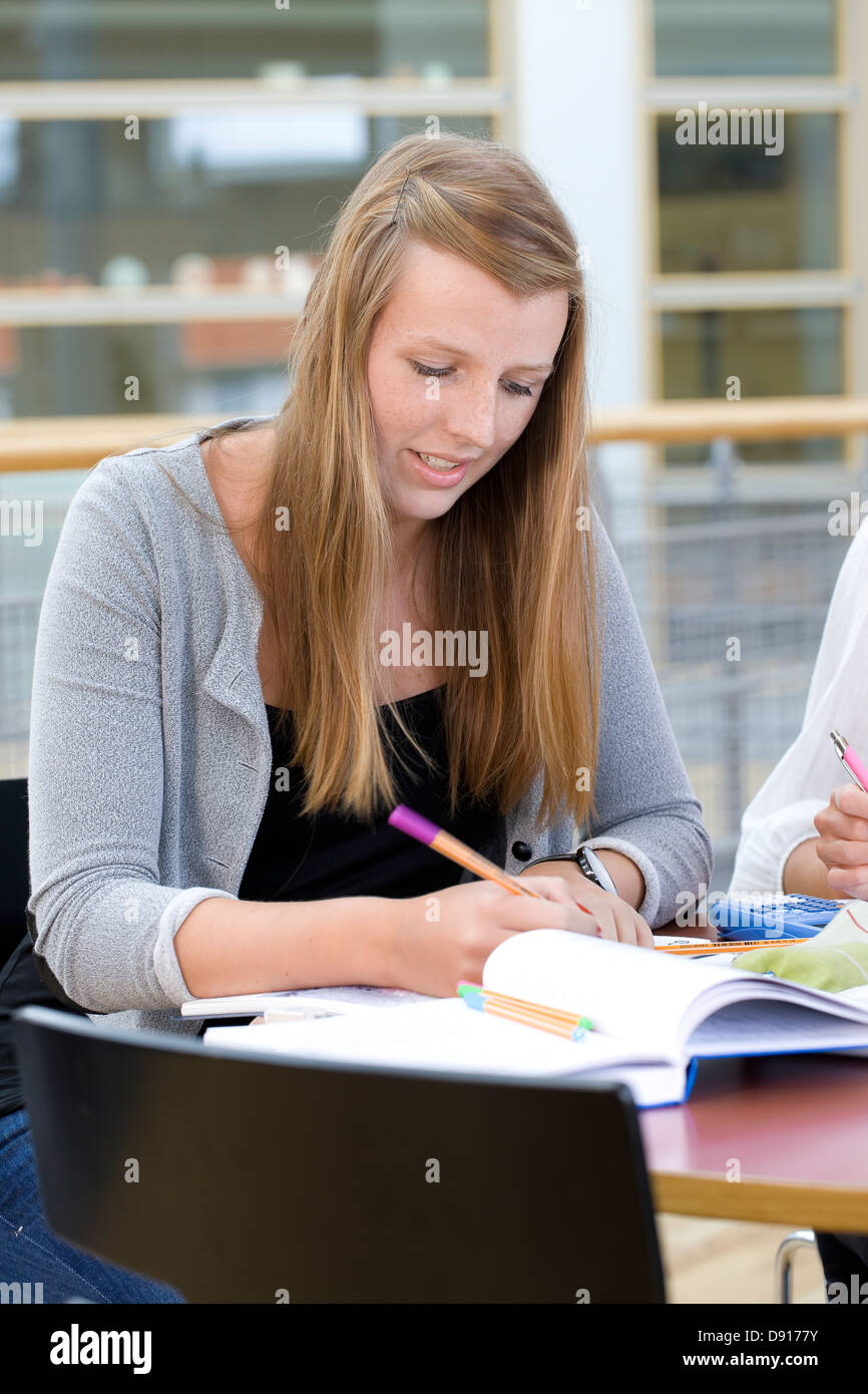 Young student smiling Stock Photo - Alamy