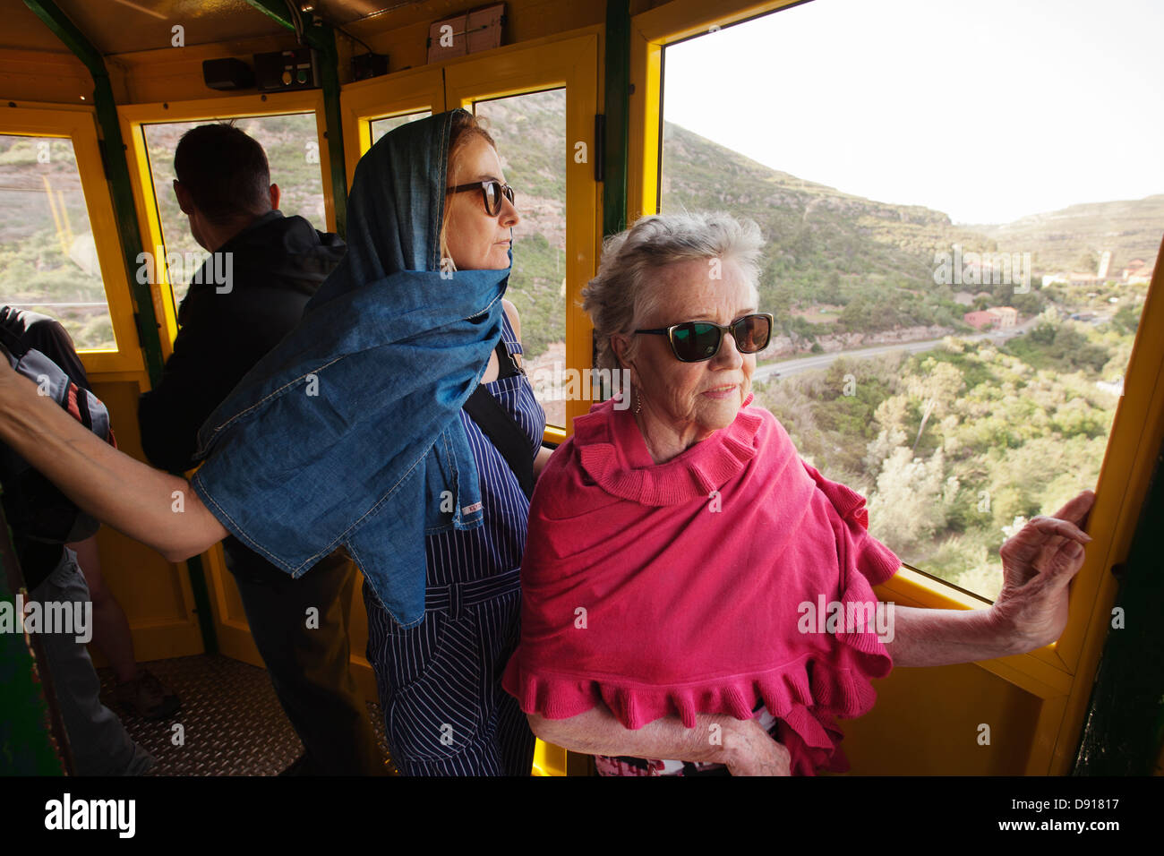 Women in cableway carriage Stock Photo - Alamy
