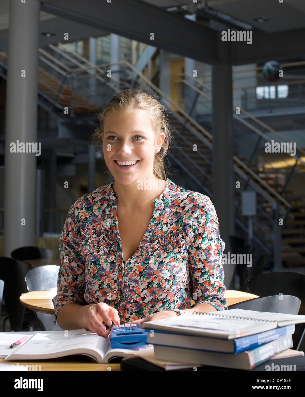 University student studying in cafe Stock Photo - Alamy