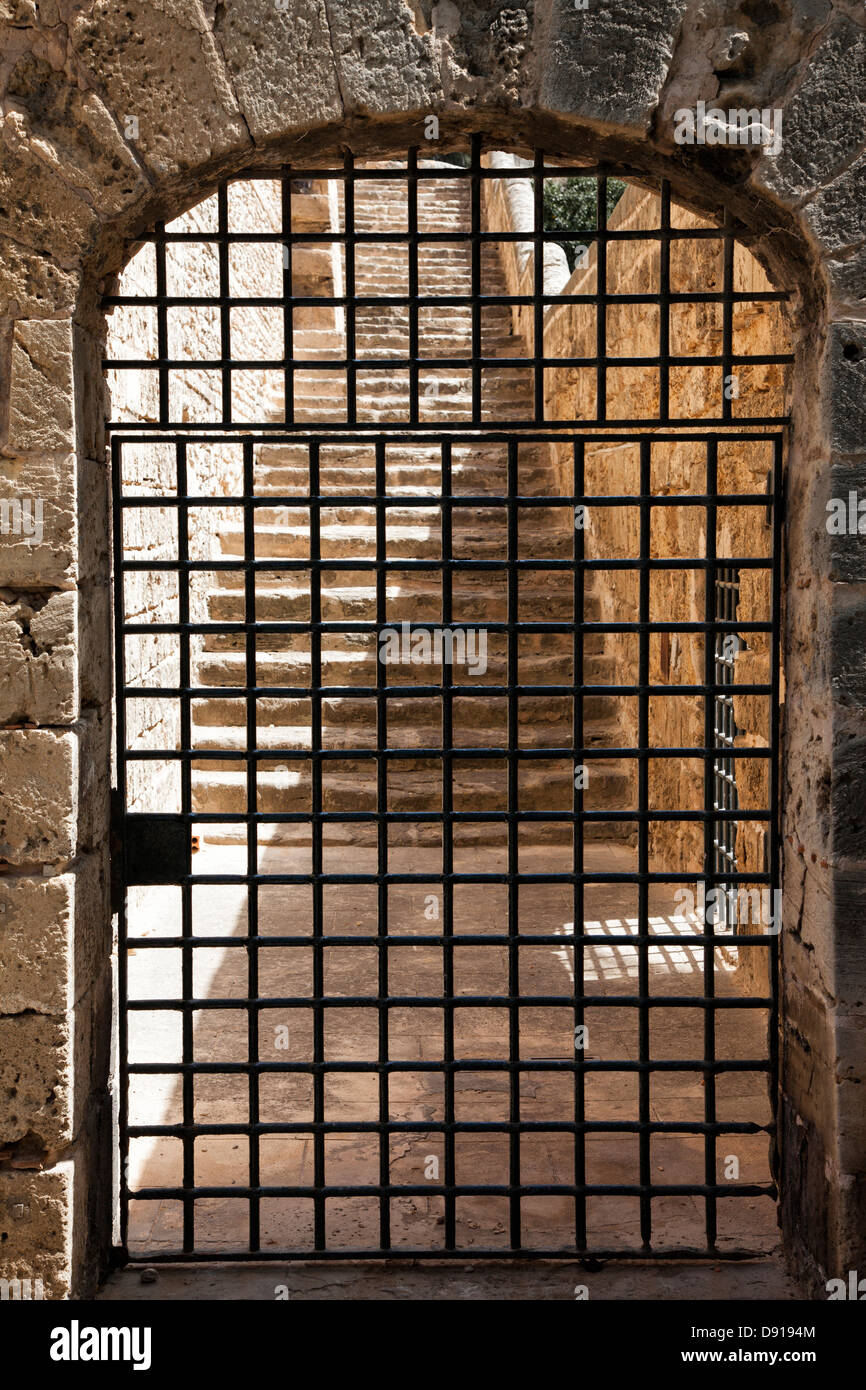 Closed wrought-iron gate in an ancient building Stock Photo - Alamy