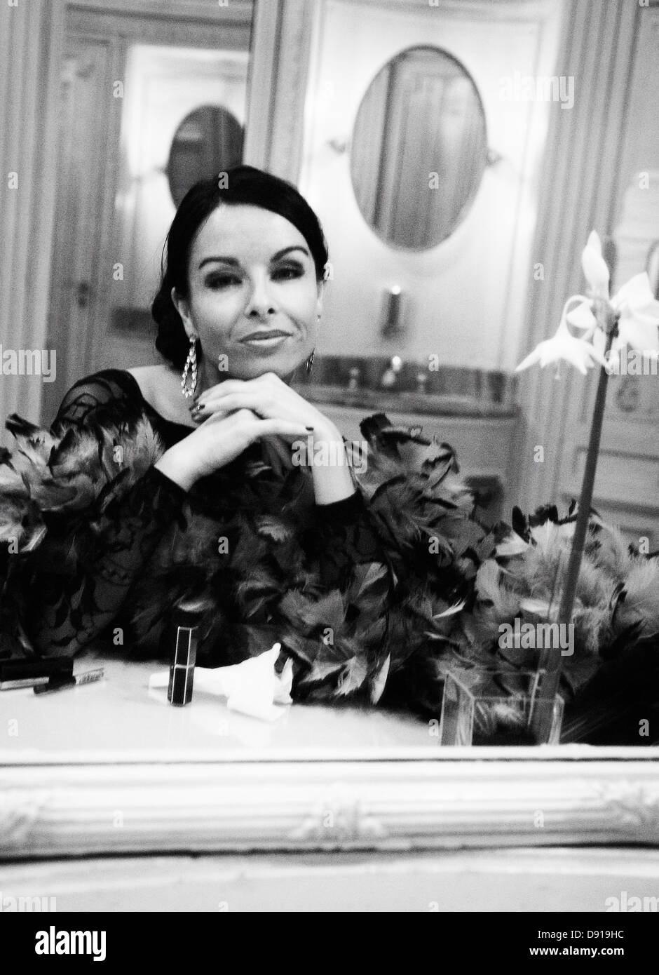 Woman smiling indoors wearing Black and White Stock Photos & Images - Alamy