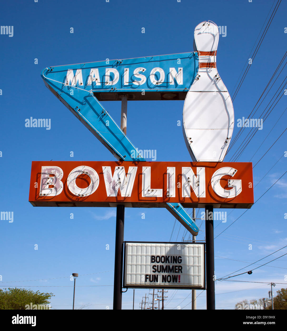 A retro bowling pin sign stands outside a bowling alley in Madison ...
