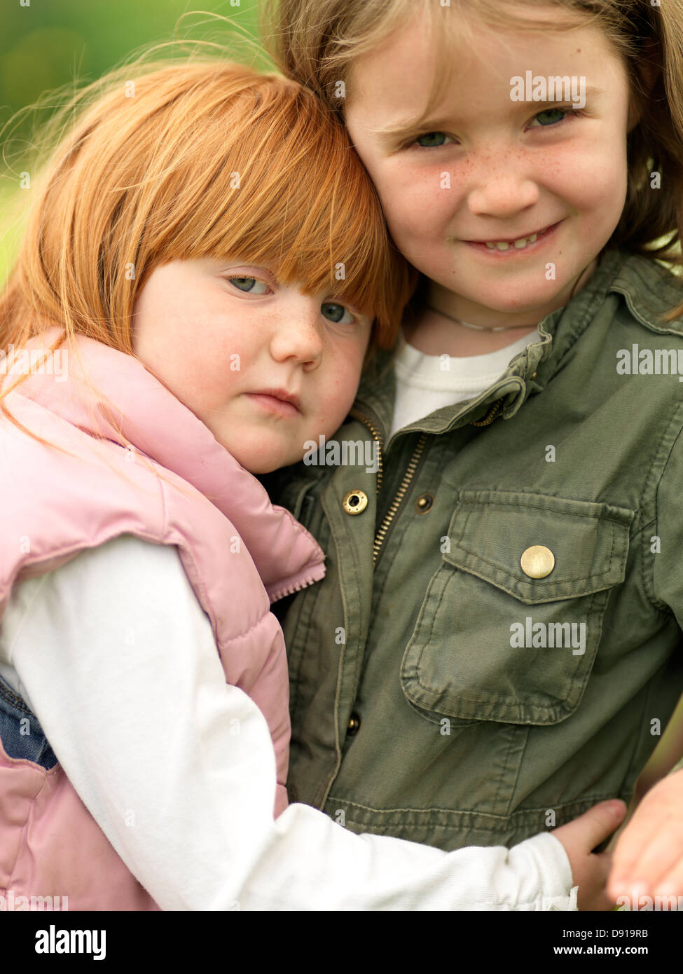 Two girls hugging, Sweden Stock Photo - Alamy