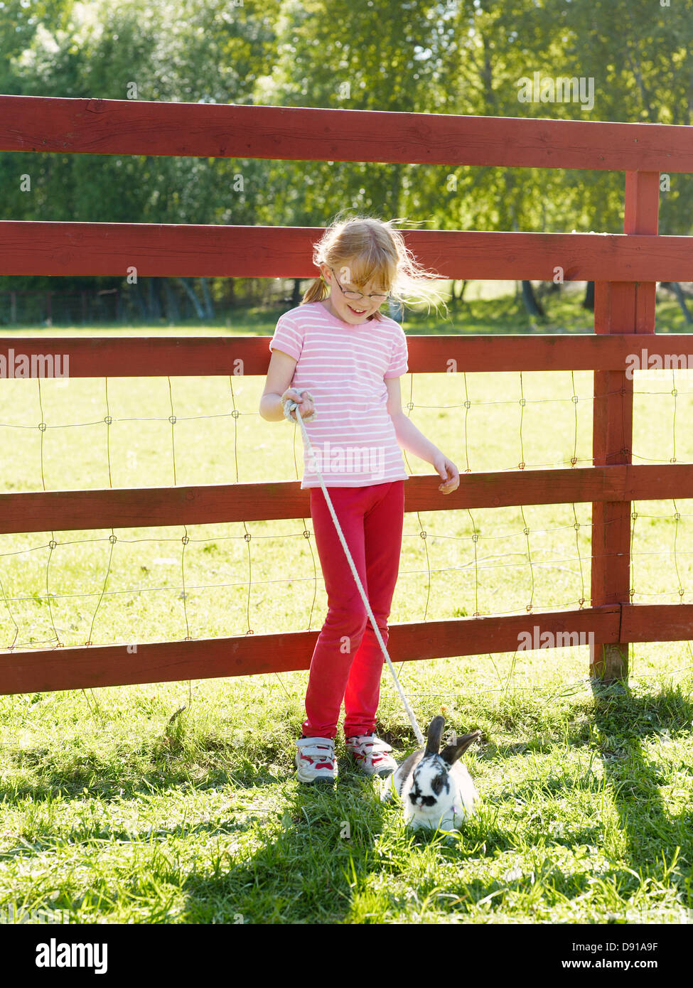Girl with a rabbit hi-res stock photography and images - Alamy
