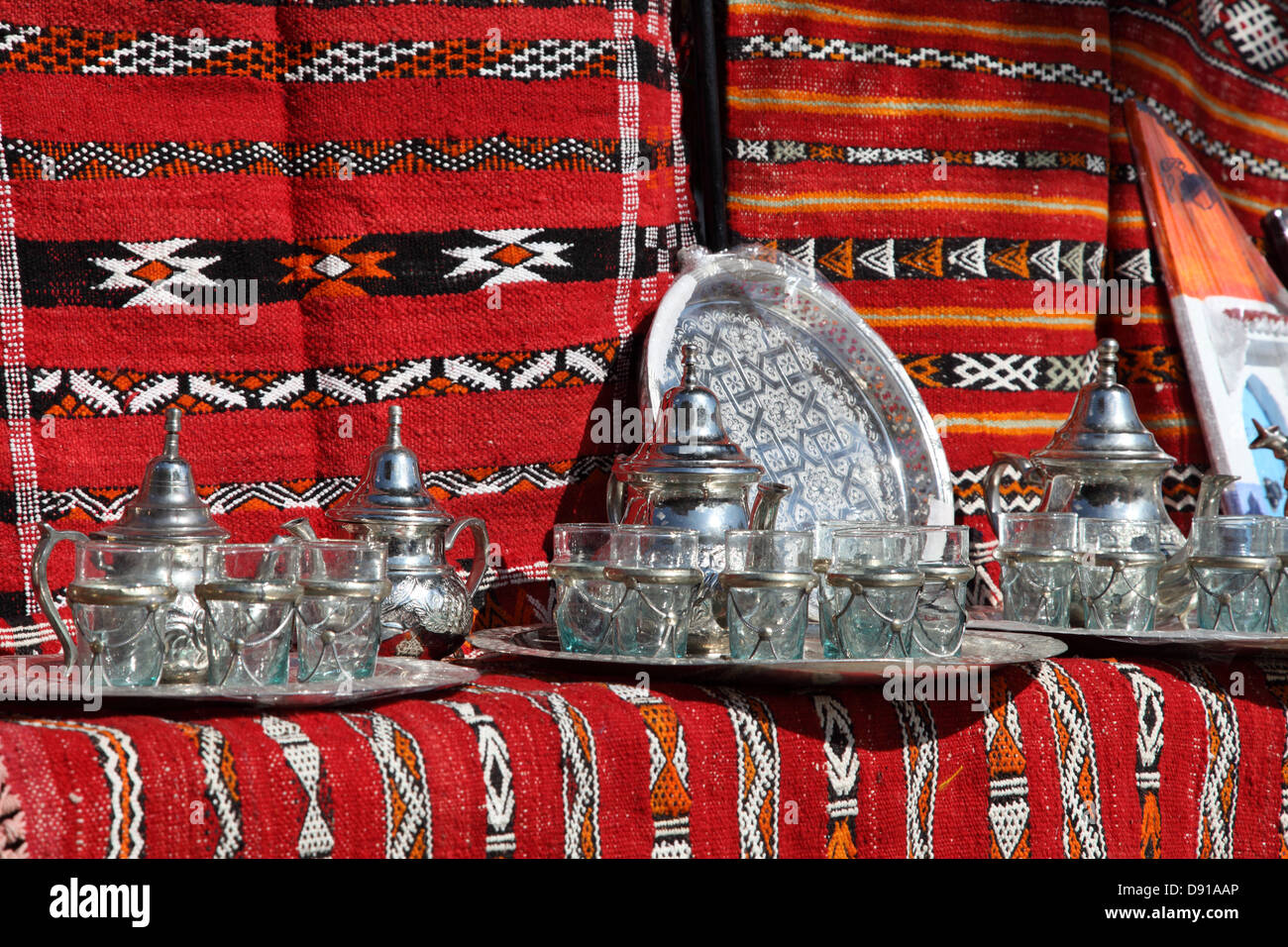 Traditional tea service and carpets for sale in Rabat, Morocco Stock ...
