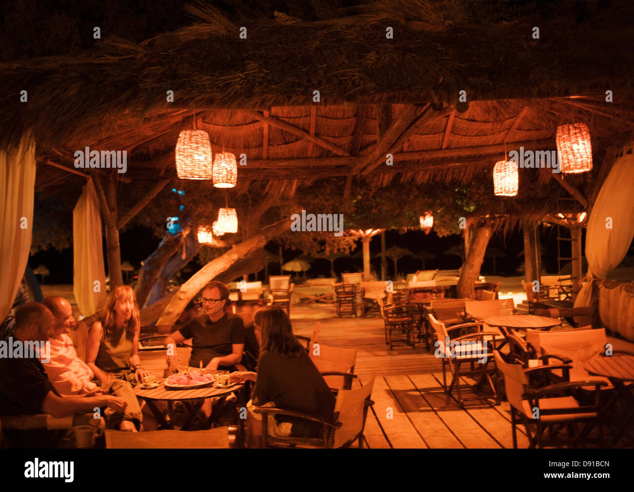 Friends in a restaurant, Greece Stock Photo - Alamy